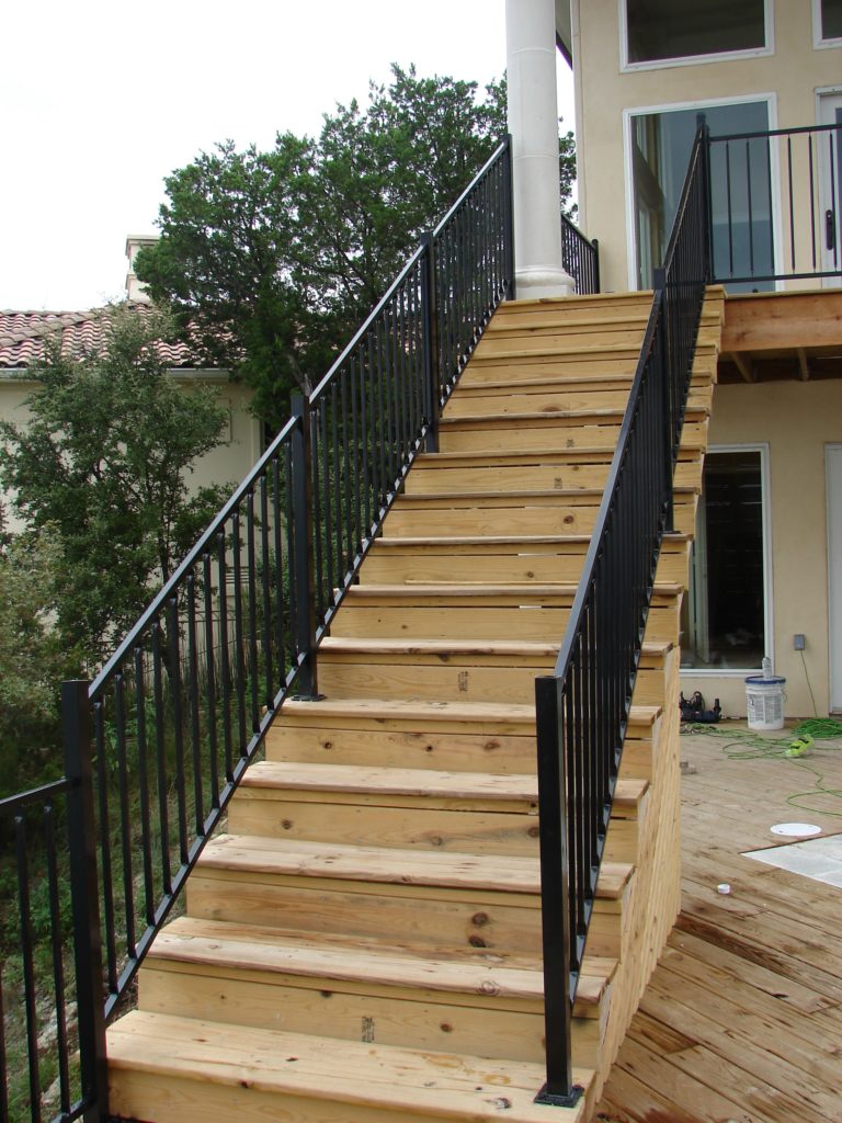 Exterior Stairs with Two-Rail Iron Guardrail - Viking Fence