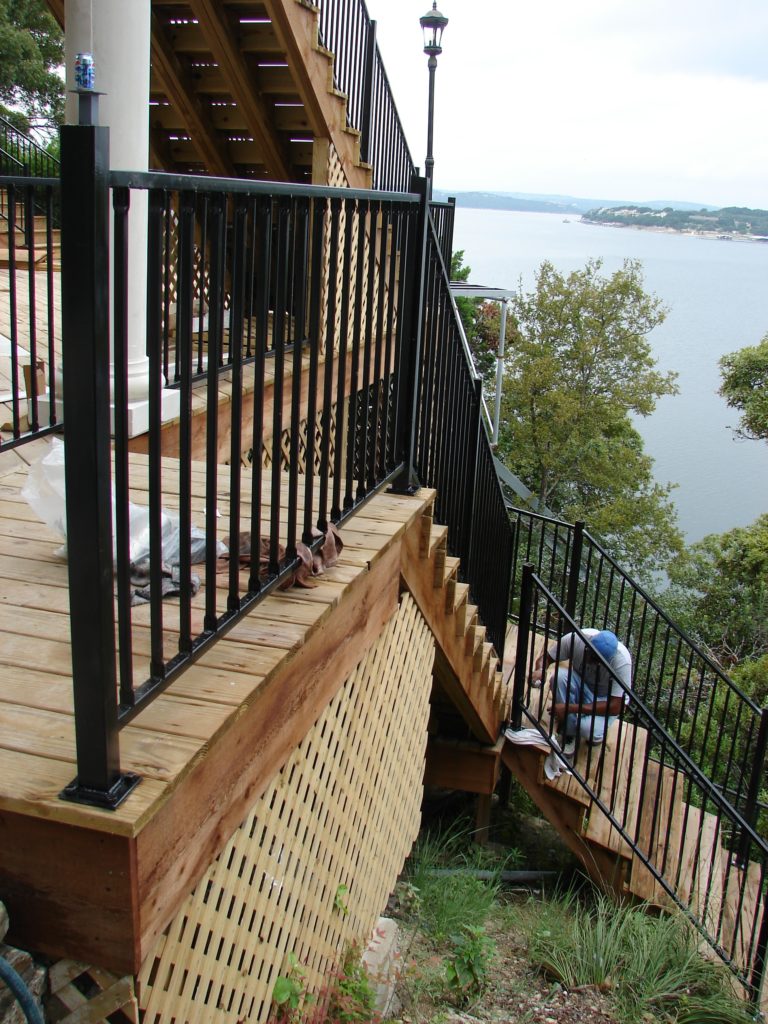 Exterior Stairs with Two-Rail Iron Guardrail - Viking Fence